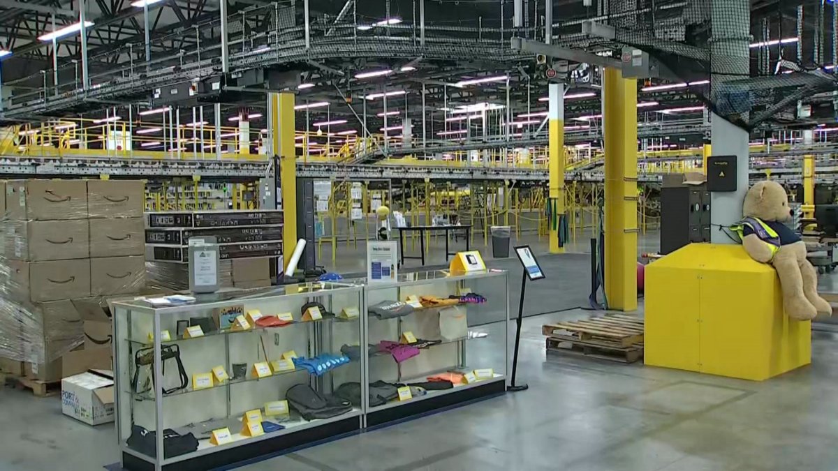 Workers Prepare For Cyber Monday Rush At Amazon Facility In Opa Locka