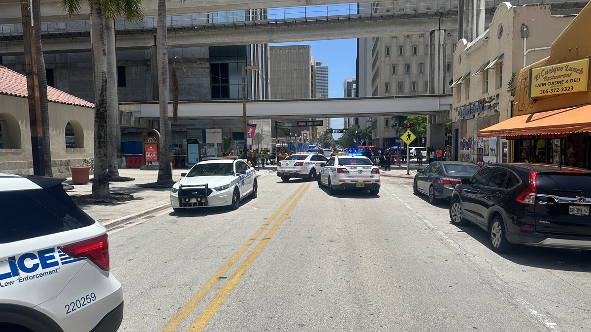 Miami bank robbery: Arrest made after hostage held in Bank of America ...