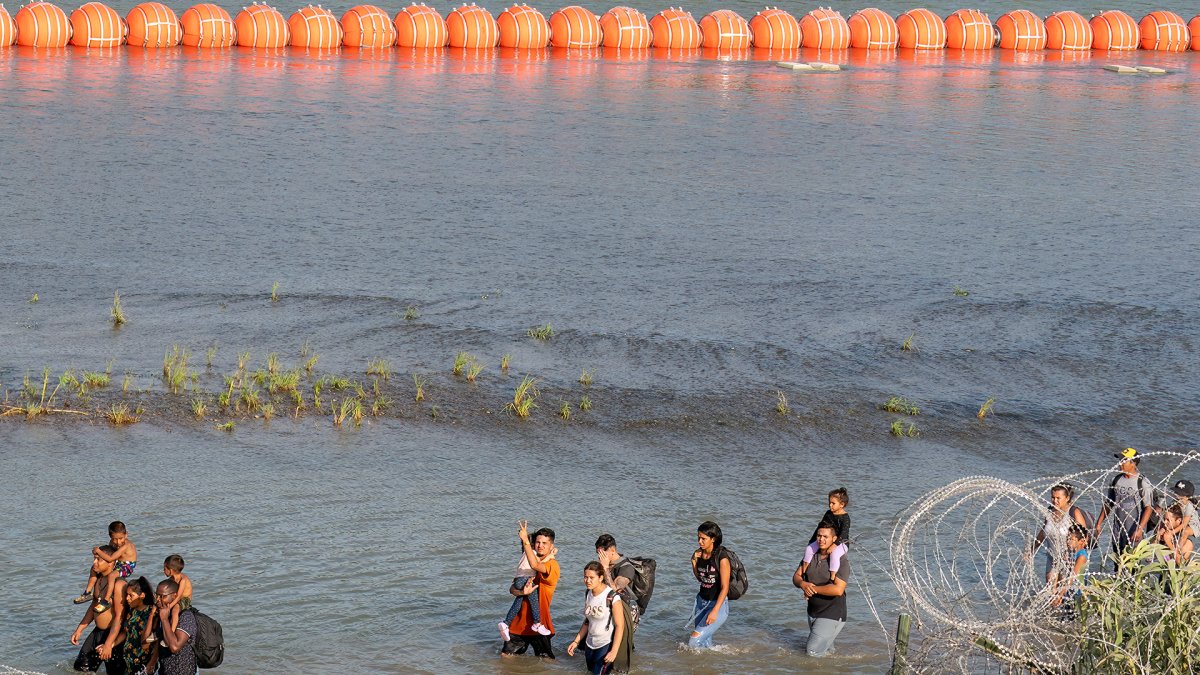 DOJ files lawsuit against Gov. Abbott, Texas over floating barriers in ...