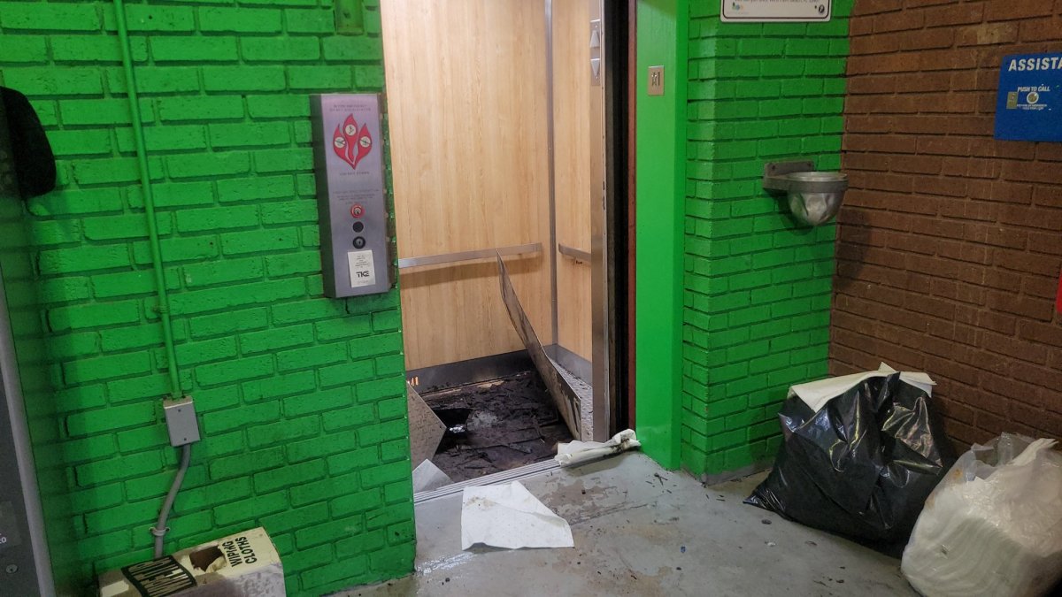Elevator crashes down on technician trapping him underneath in Florida ...