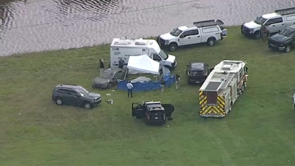 Police investigating after body found in car pulled from canal in ...