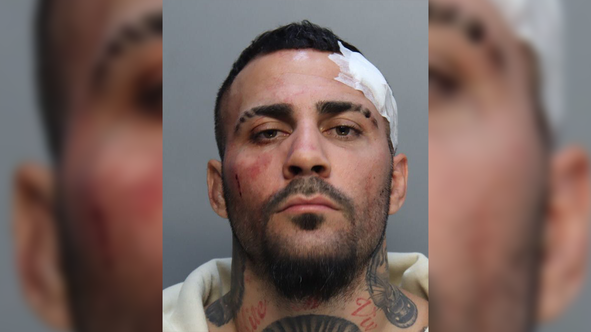 Man charged with burglary after being arrested by SWAT at apartment in ...