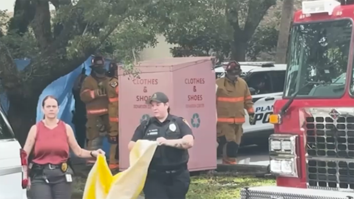 Woman dies after becoming stuck in clothing donation box in Plantation ...