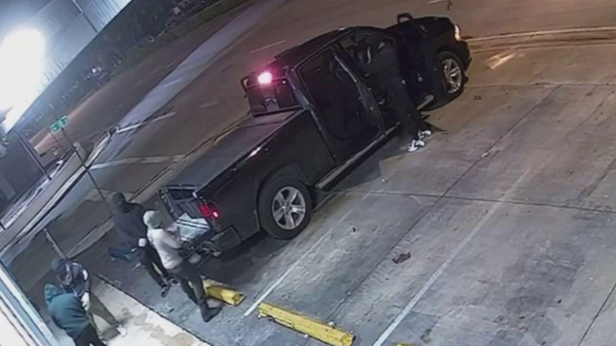 Surveillance video shows thieves smashing door, breaking into store in ...