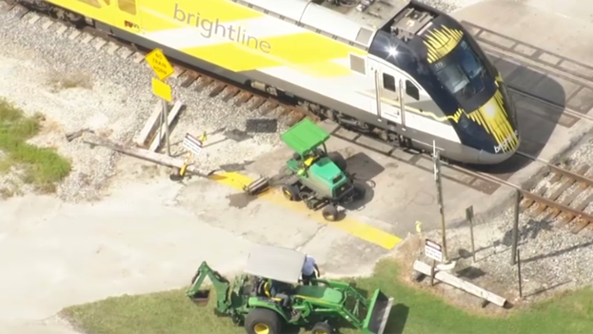 Person hospitalized after Brightline train hits vehicle in NE Miami ...